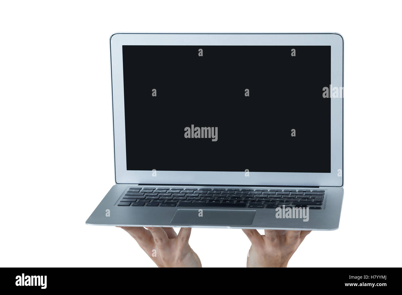 Hands holding laptop against white background Stock Photo - Alamy