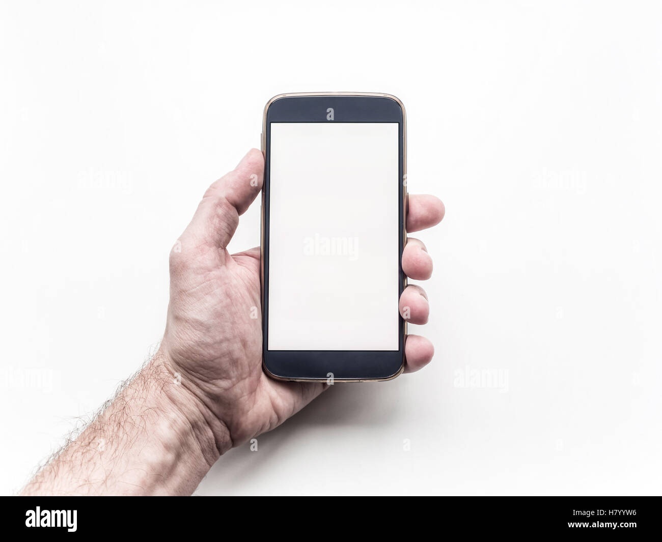 Man's hand holding and using mobile smartphone on white background ...