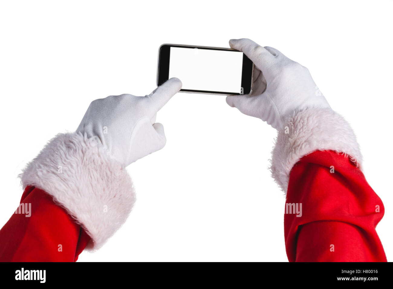 Santa claus using mobile phone Stock Photo - Alamy