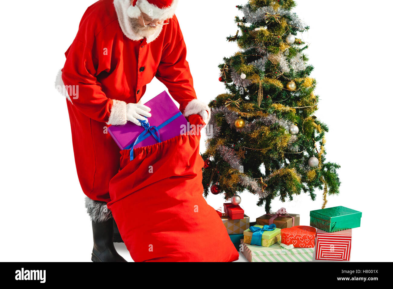 Christmas Santa Claus oranment in front of other decorations Stock ...