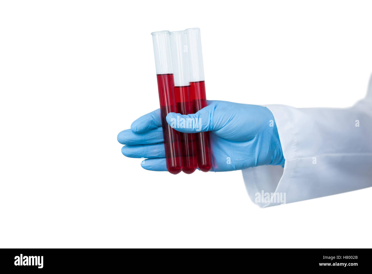 Holding three test tubes hi-res stock photography and images - Alamy