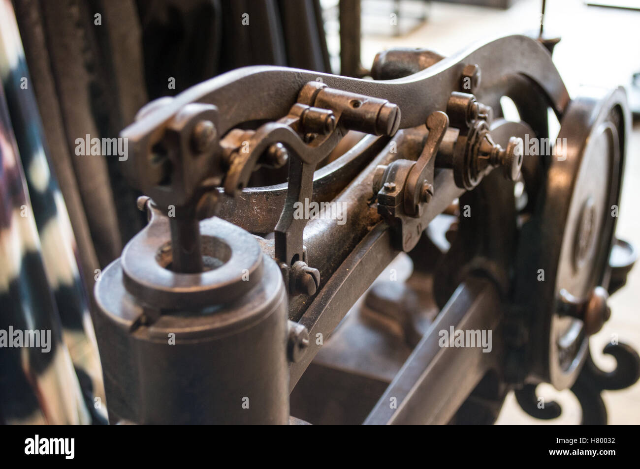 Old cast iron heavy duty sewing machine Stock Photo - Alamy