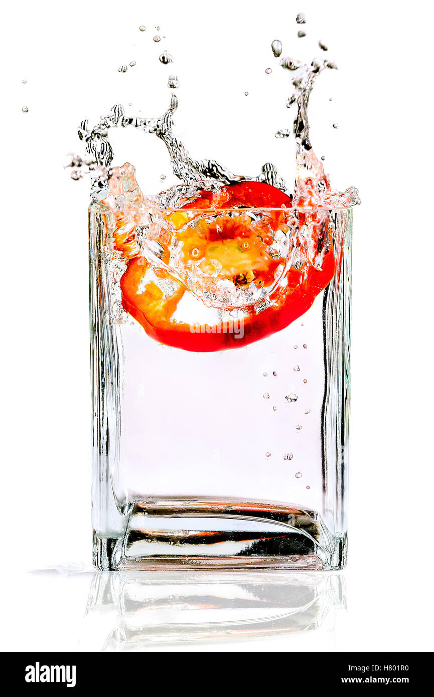 sliced and falling red pepper isolated on white background Stock Photo ...