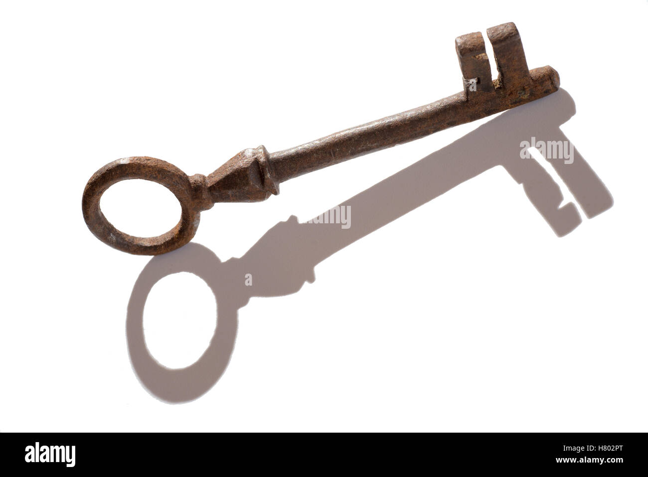 Skeleton key and its shadow isolated on white background Stock Photo ...