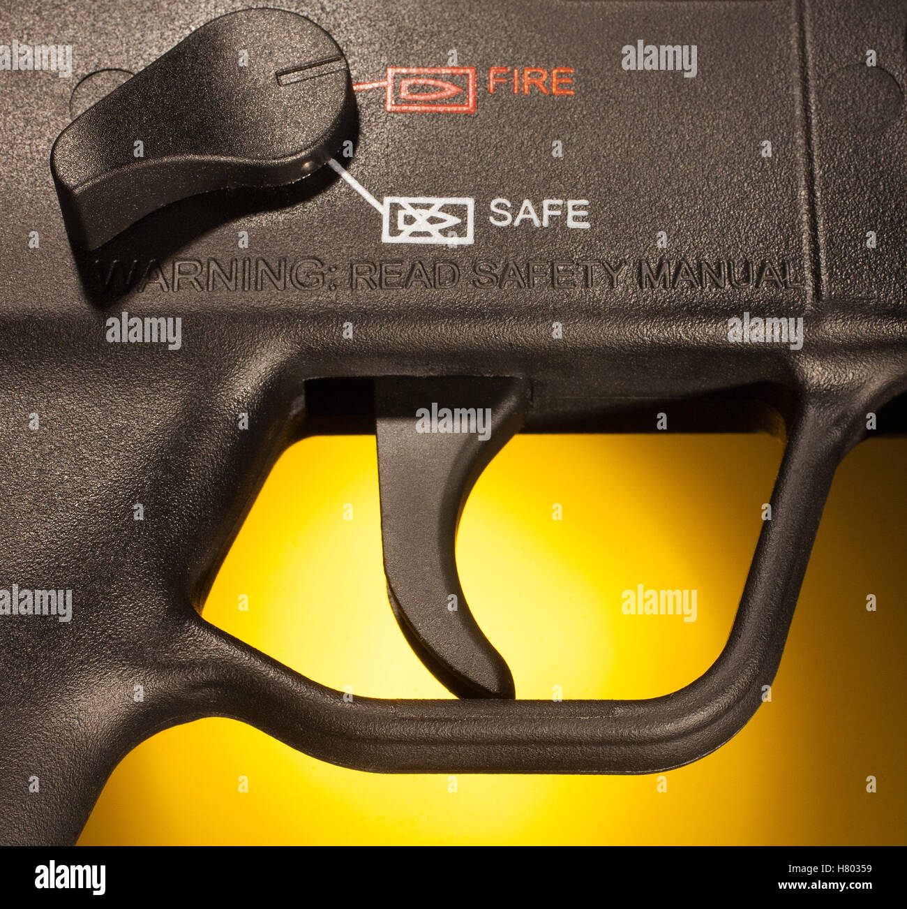 Rifle trigger and safety that is in the fire position Stock Photo - Alamy