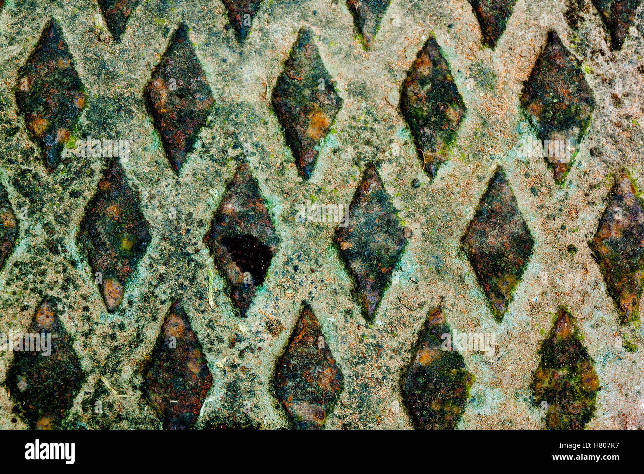 Close up detail of colorful diamond shape grungy patterns and texture ...