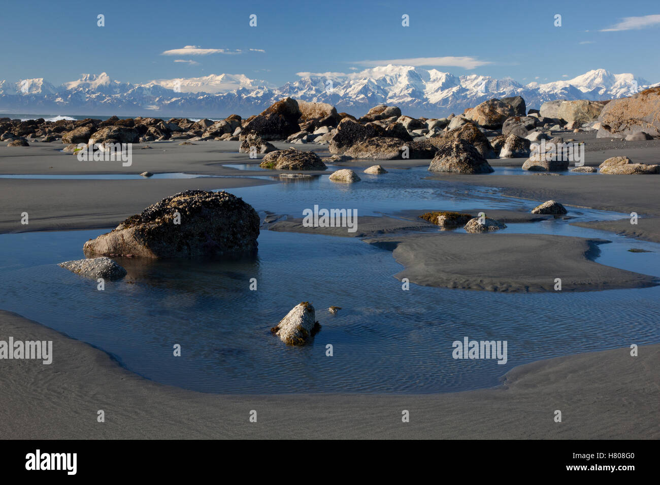 View from Ocean Cape toward Mount Logan across rocky beachbeachs ...