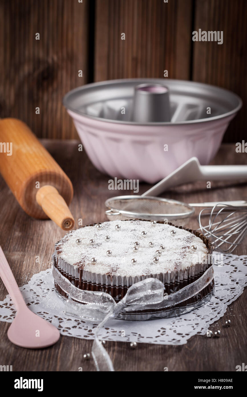 Homemade Christmas cake with baking utensils Stock Photo - Alamy