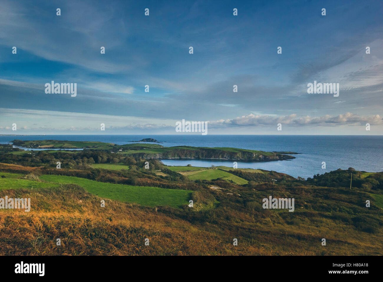 A beautiful irish landscape with a clear blue sky, blue sea, autumn ...