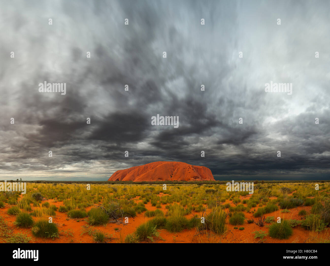 Ayers Rock and storm clouds, Uluru-kata Tjuta National Park, Northern ...