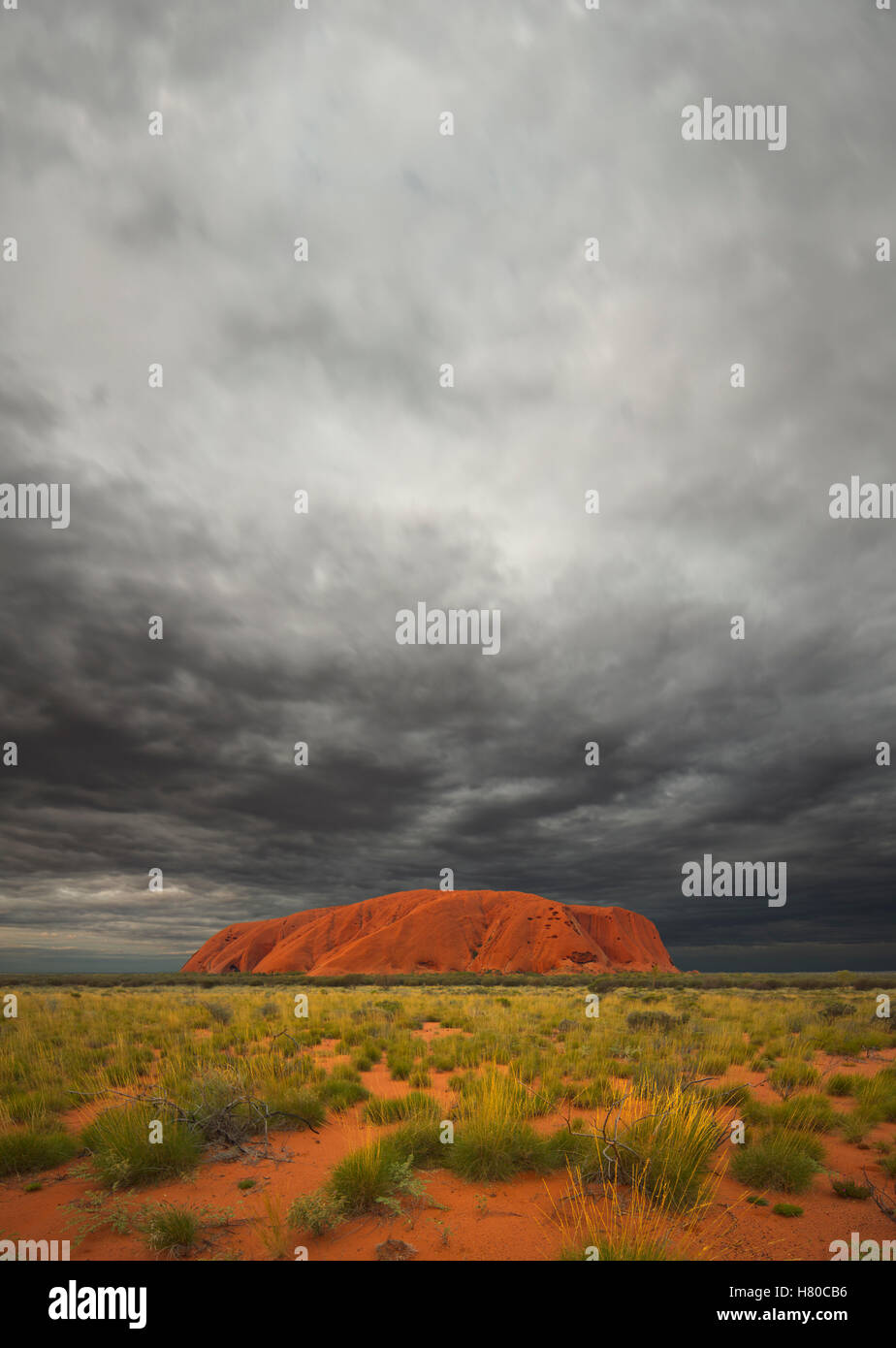 Ayers Rock and storm clouds, Uluru-kata Tjuta National Park, Northern ...