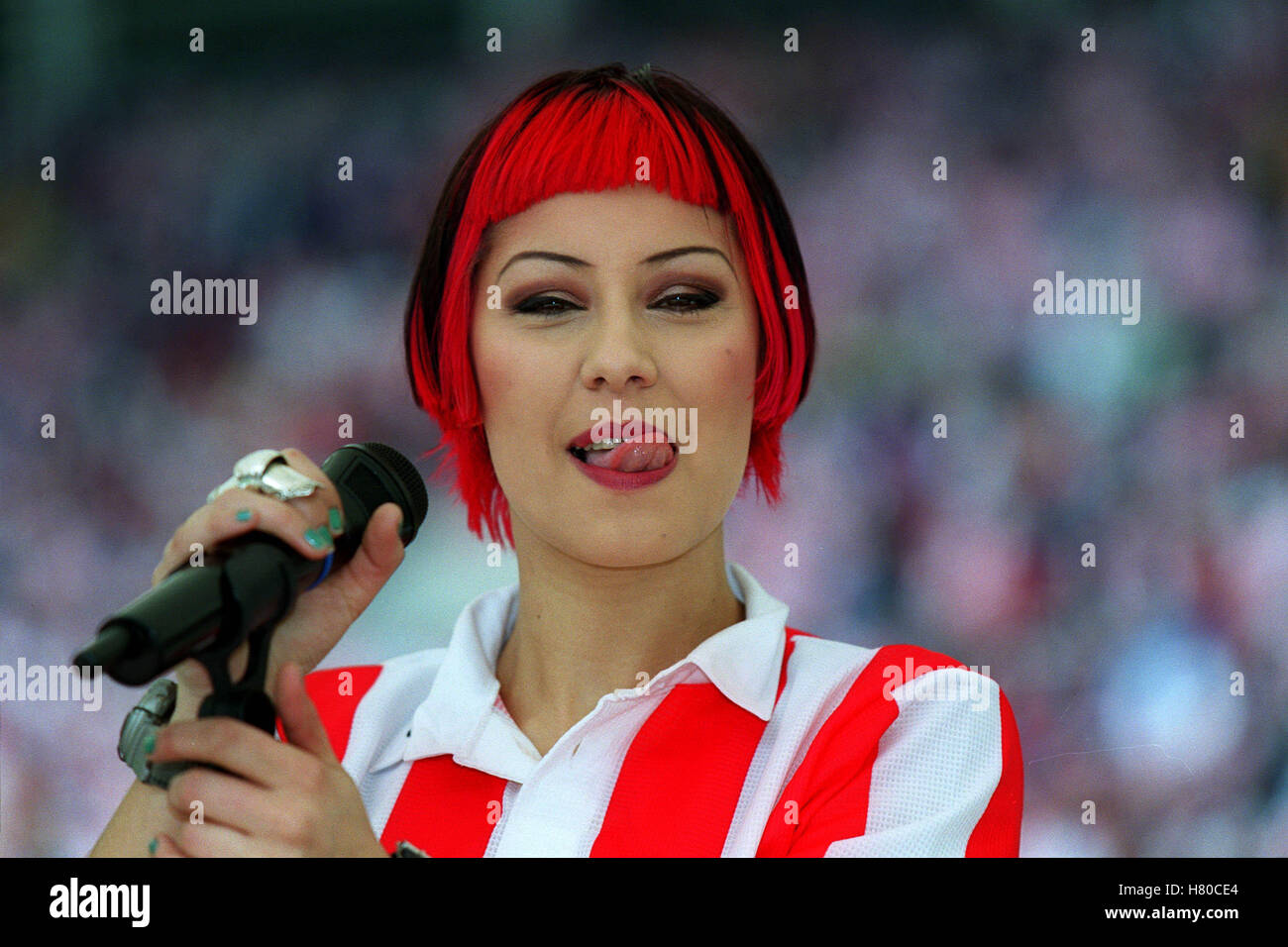 Saffron singer hi-res stock photography and images - Alamy