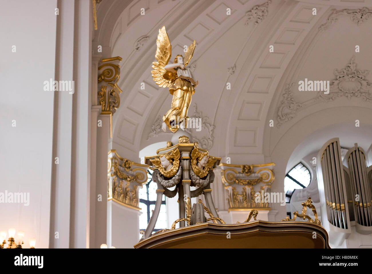 Angel statue with gold wings from inside a church in Hamburg, Germany ...