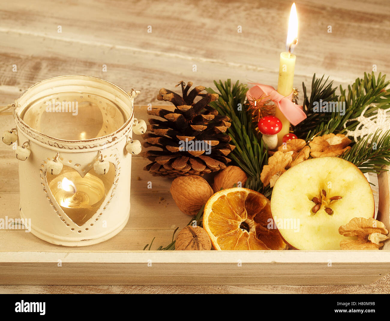 Christmas still life with candle Stock Photo - Alamy