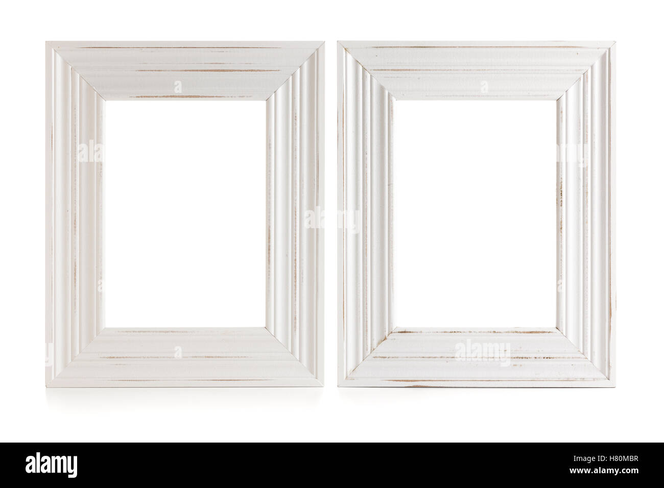 Two wooden vintage styled picture frames isolated with clipping paths ...
