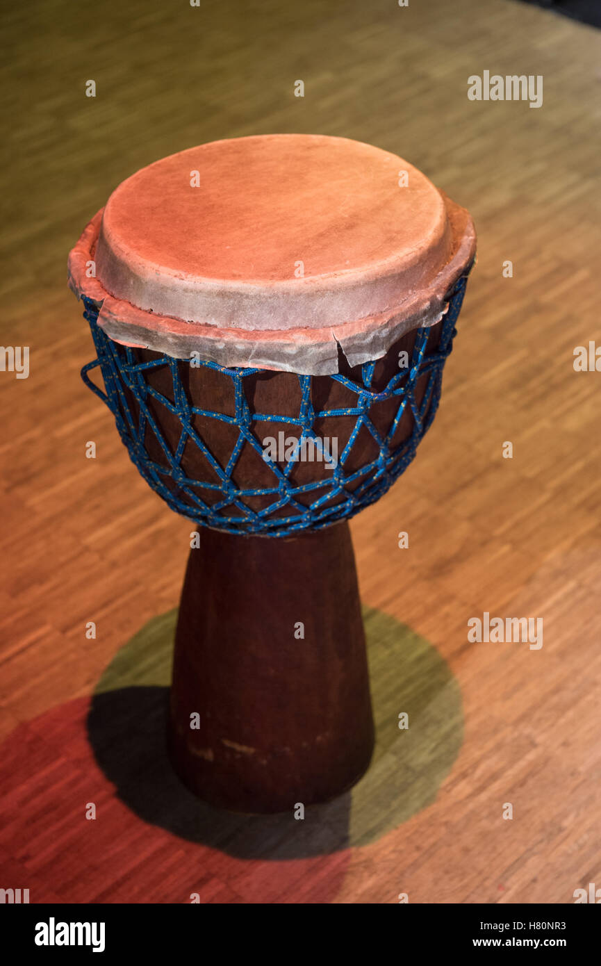 Traditional wooden african djembe drum on stage, France Stock Photo - Alamy