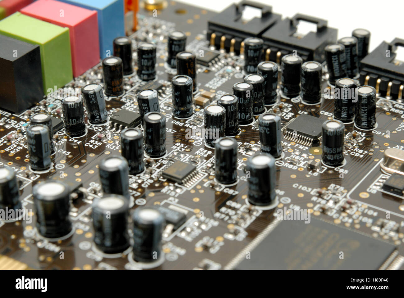 The printed-circuit-board with computer chips resistors and condensers ...