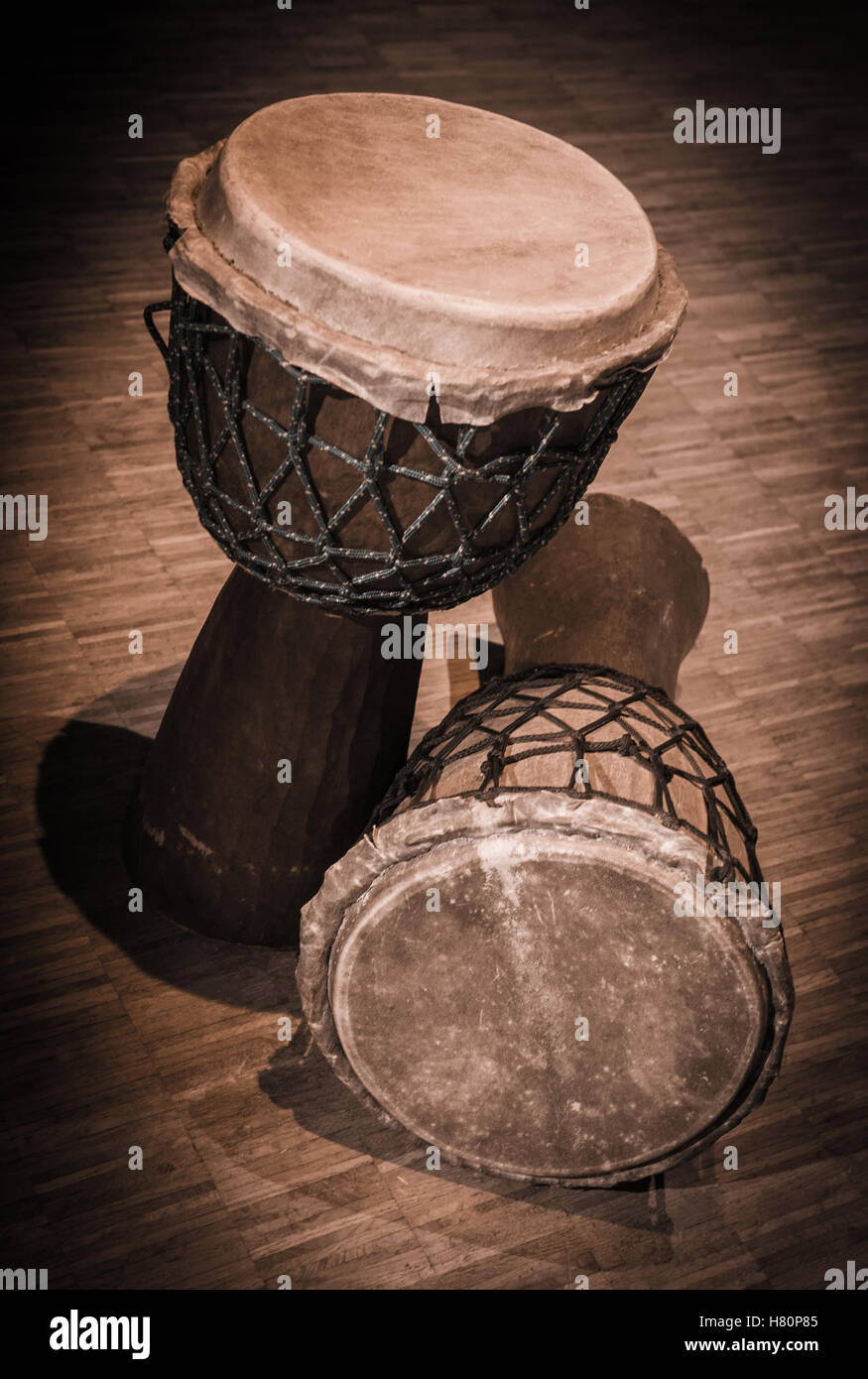 Traditional wooden african djembe drum on stage, France Stock Photo - Alamy