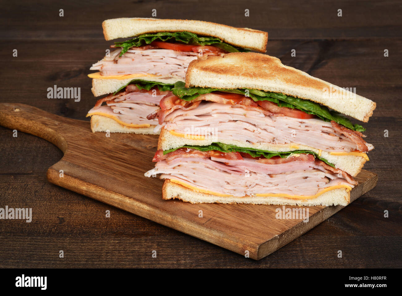 closeup toasted chicken club sandwich Stock Photo - Alamy