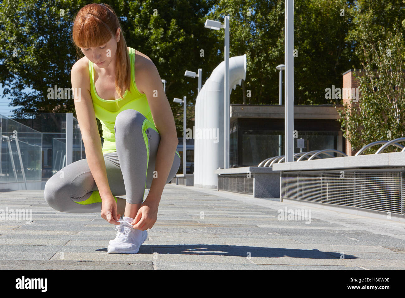 Woman tying tie female hi-res stock photography and images - Alamy