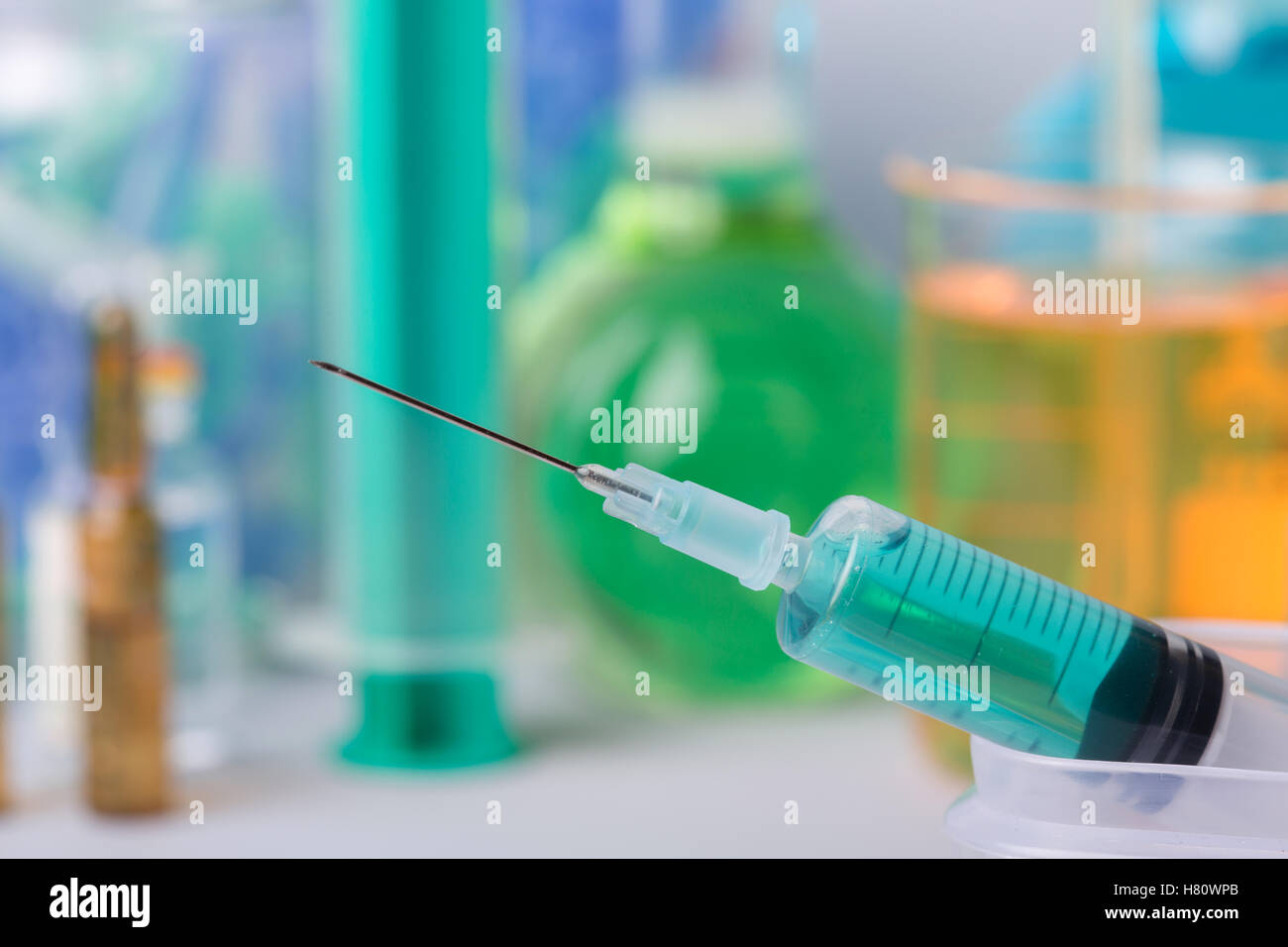 syringe with ampules of drugs Stock Photo - Alamy