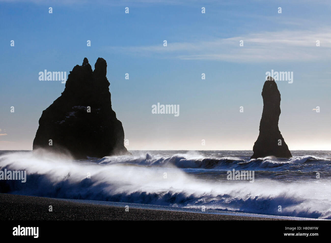Reynisdrangar, basalt sea stacks near the village Vík í Mýrdal ...