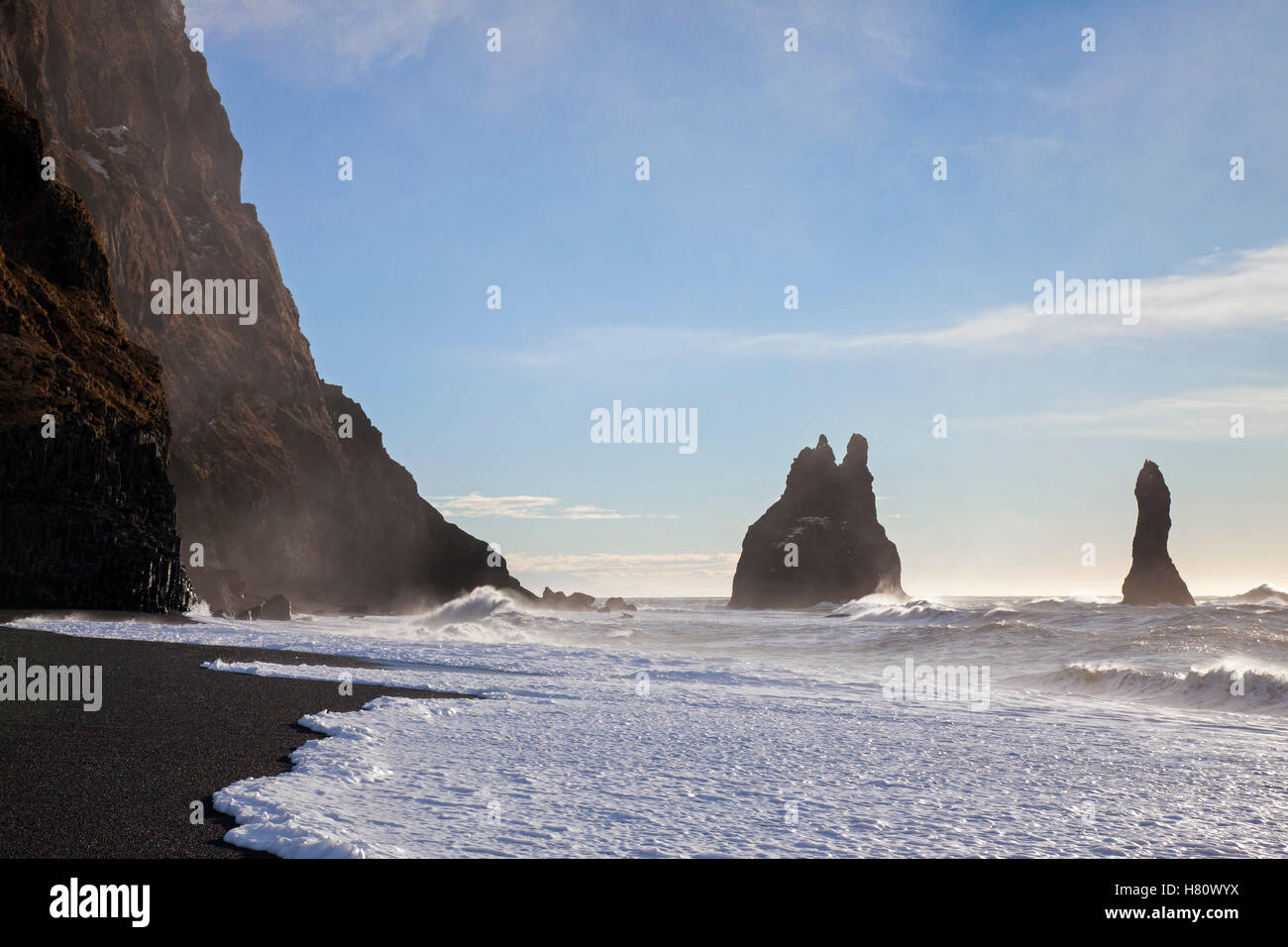 Reynisdrangar, basalt sea stacks near the village Vík í Mýrdal ...