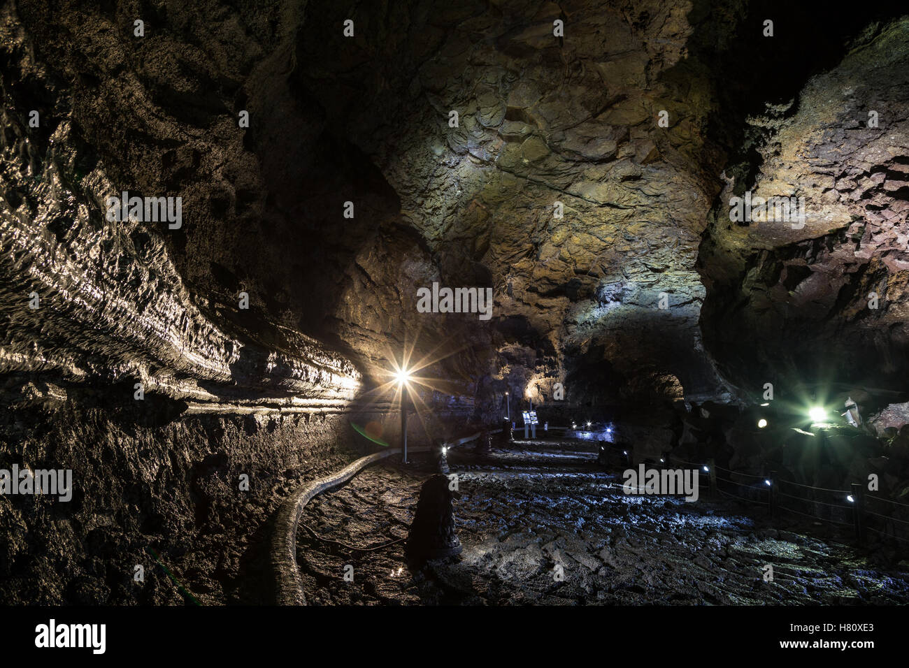 Inside the dark, lit and empty Manjanggul Lava Tube Cave on Jeju Island ...