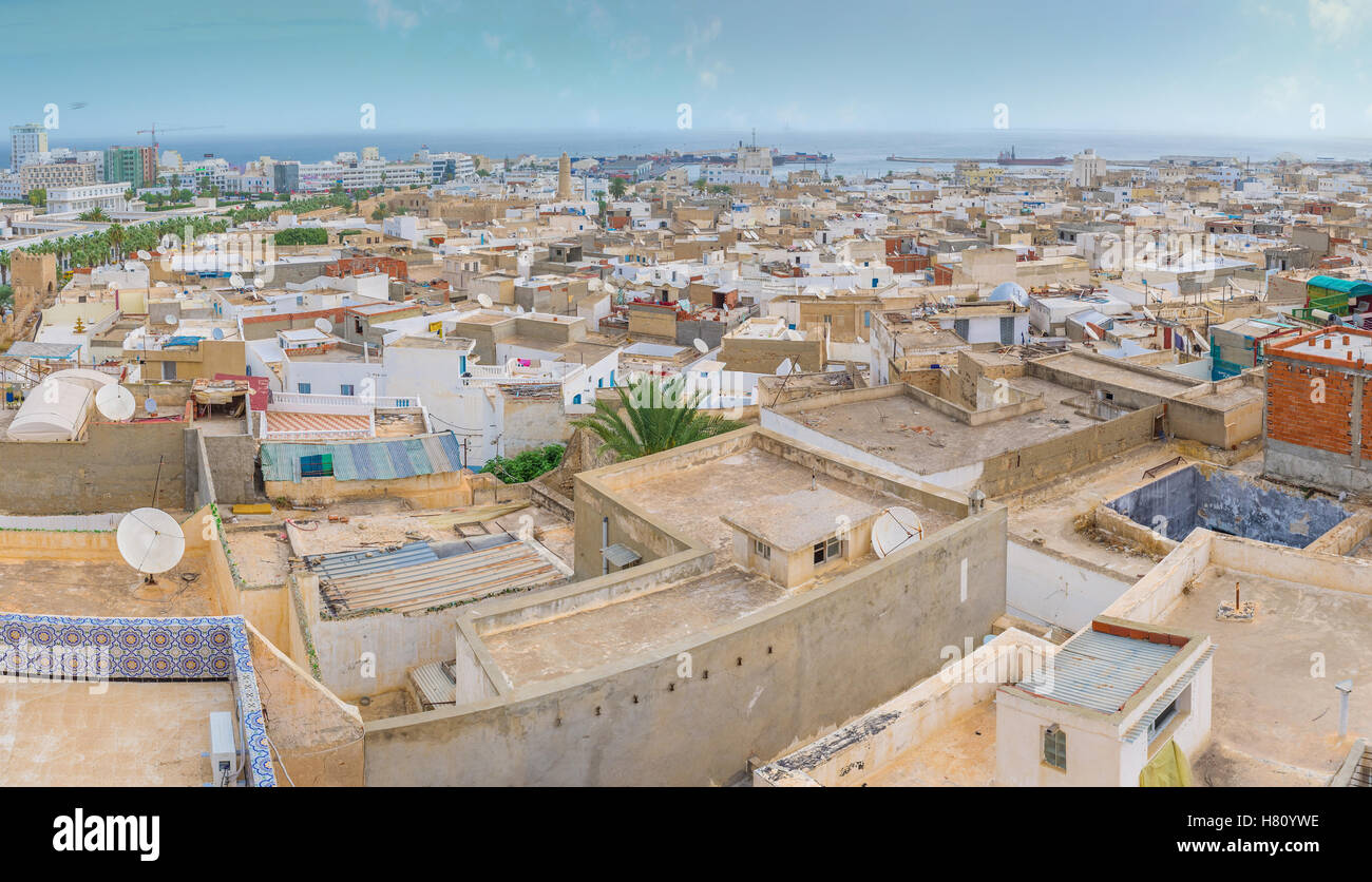 The aerial view of Medina and port from the high tower of Dar Essid ...