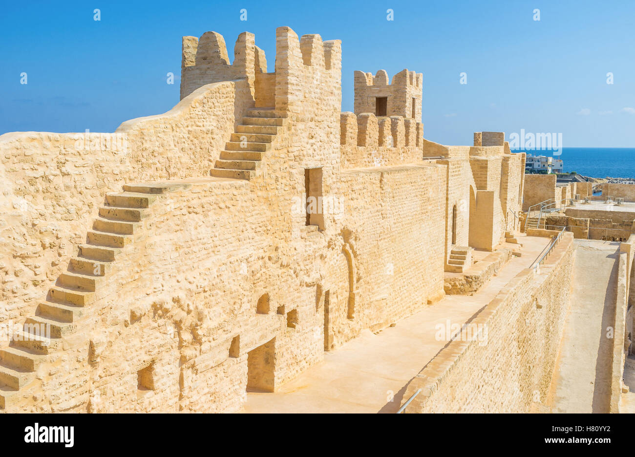 The huge ramparts of Ribat citadel with the small towers from each side ...