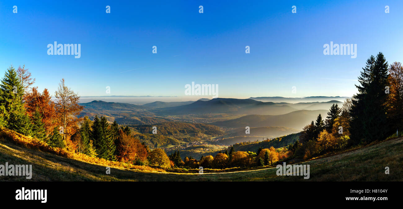 Aerial view of colorful autumnal mountains, foggy sunset, Vosges ...