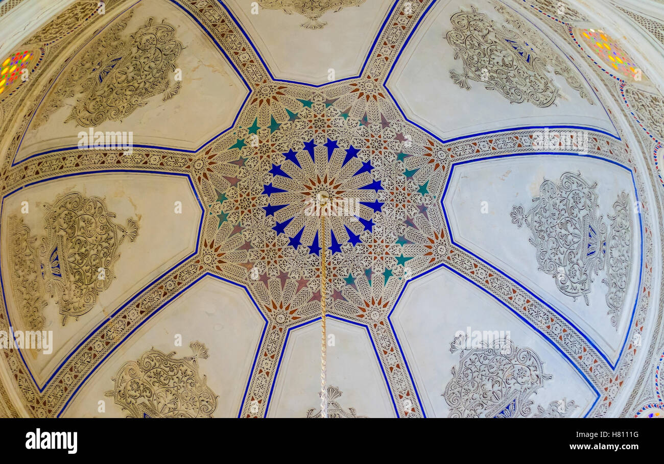 The white plaster cupola decorated with the stellar islamic patterns in ...