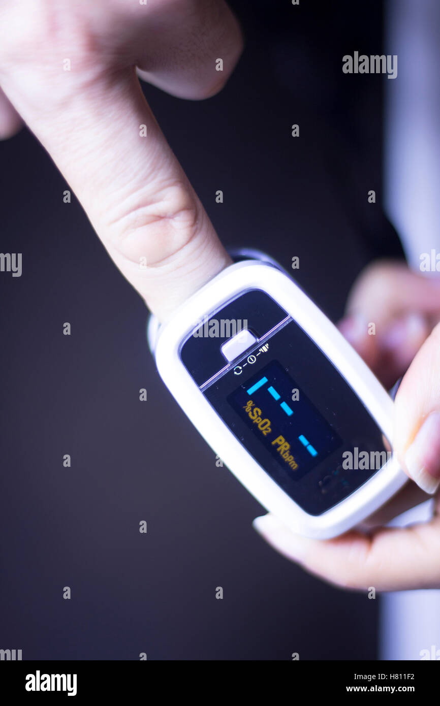 Portable hand held mini domestic cardiac finger pulse rate meter to ...