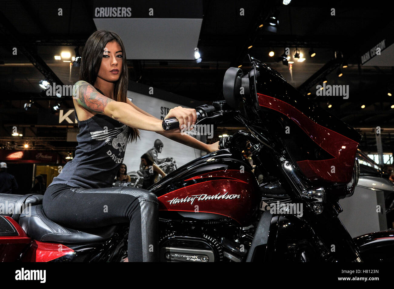 Milan, Italy. 08th Nov, 2016. A model on a Harley D avidson motorbike ...
