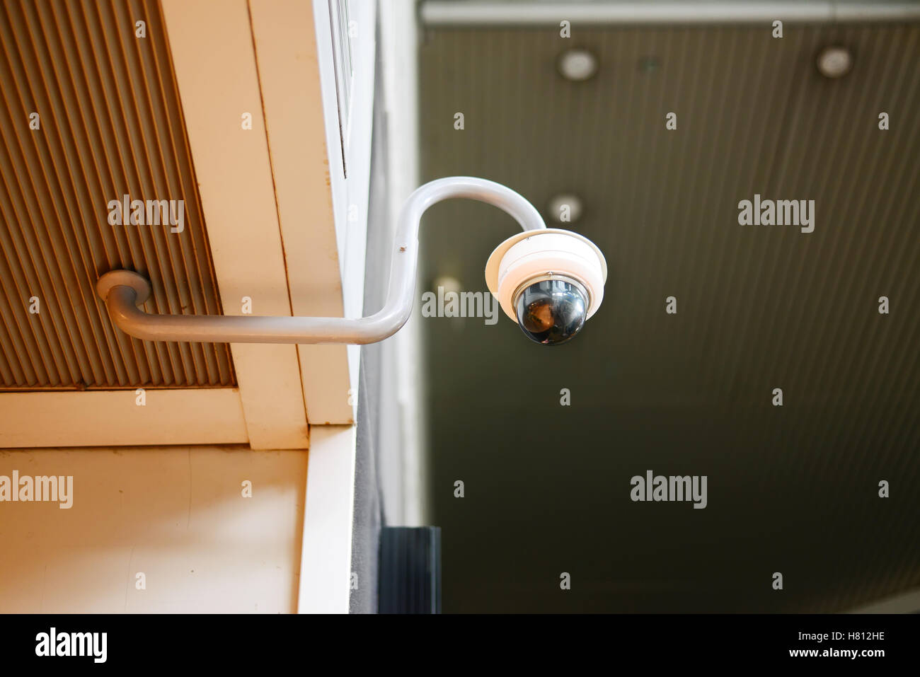 CCTV Security camera wall ceiling Stock Photo - Alamy