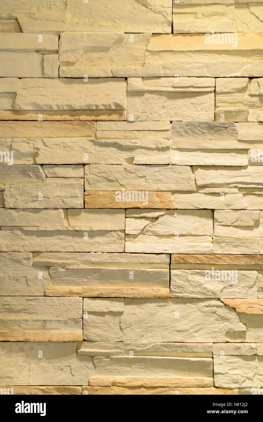 modern style design yellow brick on the wall Stock Photo - Alamy