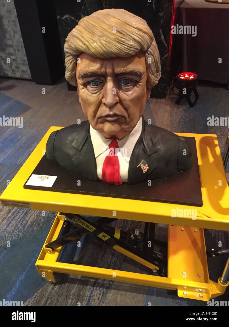 A cake moulded into the shape of Donald Trump's head, and made by ...