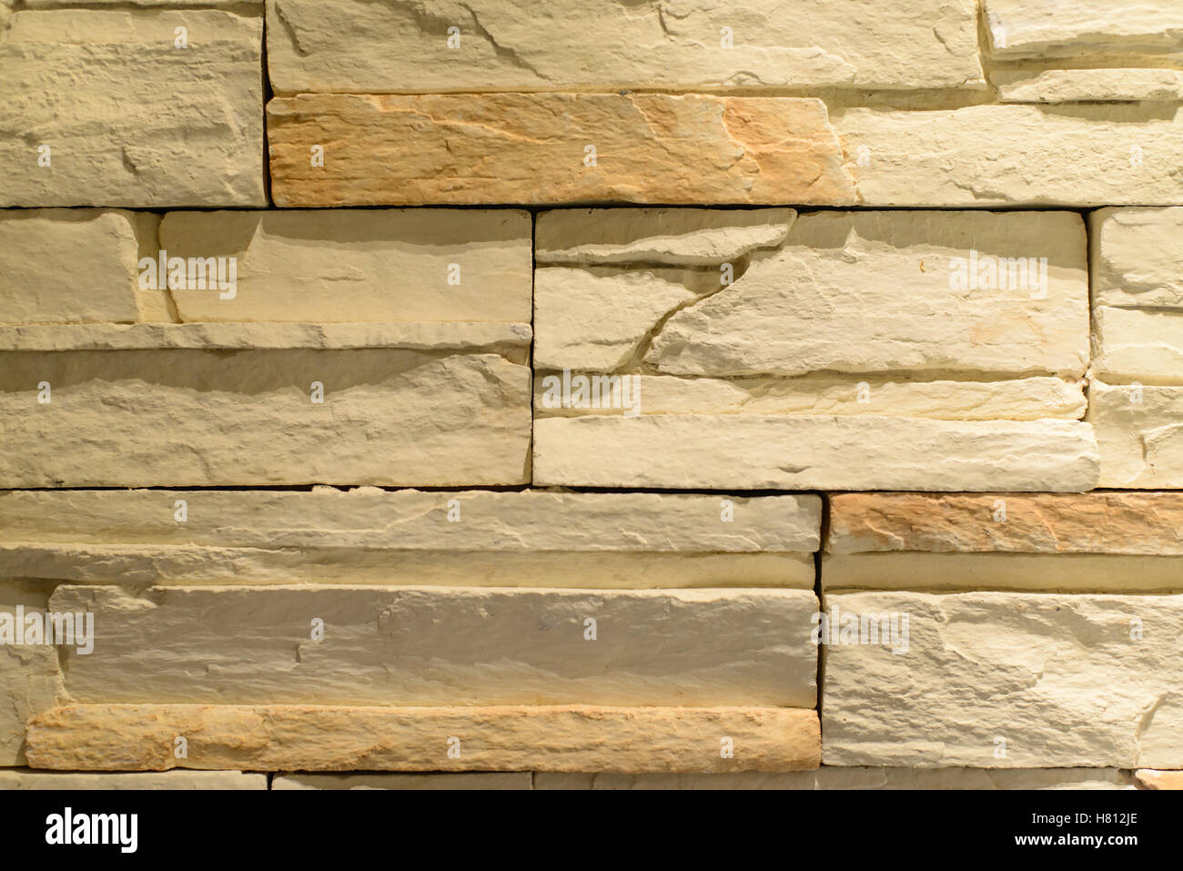 modern style design yellow brick on the wall Stock Photo - Alamy