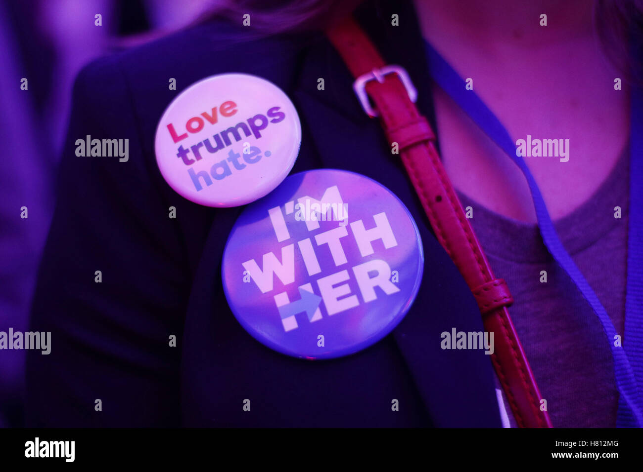 A guest with pro-Hillary Clinton badges attending the US Embassy's ...