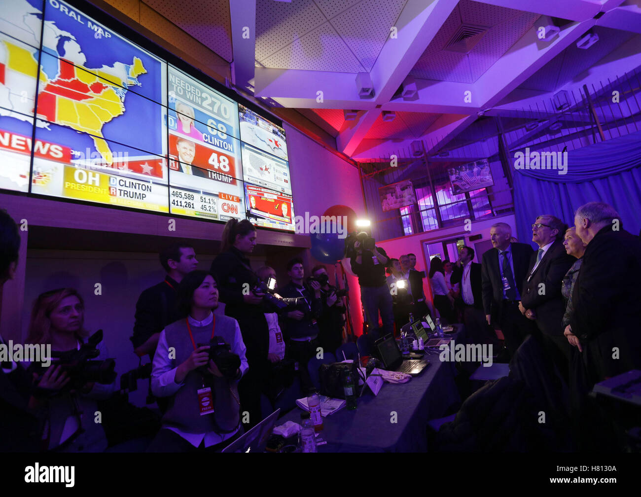 Guests watching the live feed on a big screen at the US presidential ...