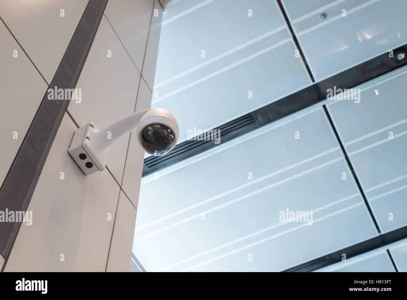 CCTV Security camera wall ceiling Stock Photo - Alamy