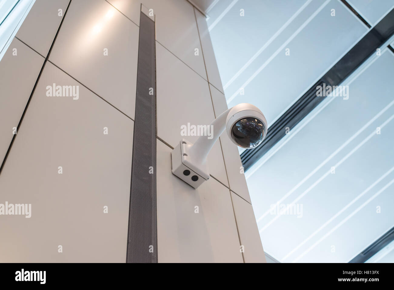 CCTV Security camera wall ceiling Stock Photo - Alamy