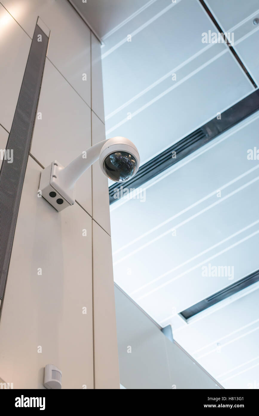 CCTV Security camera wall ceiling Stock Photo - Alamy