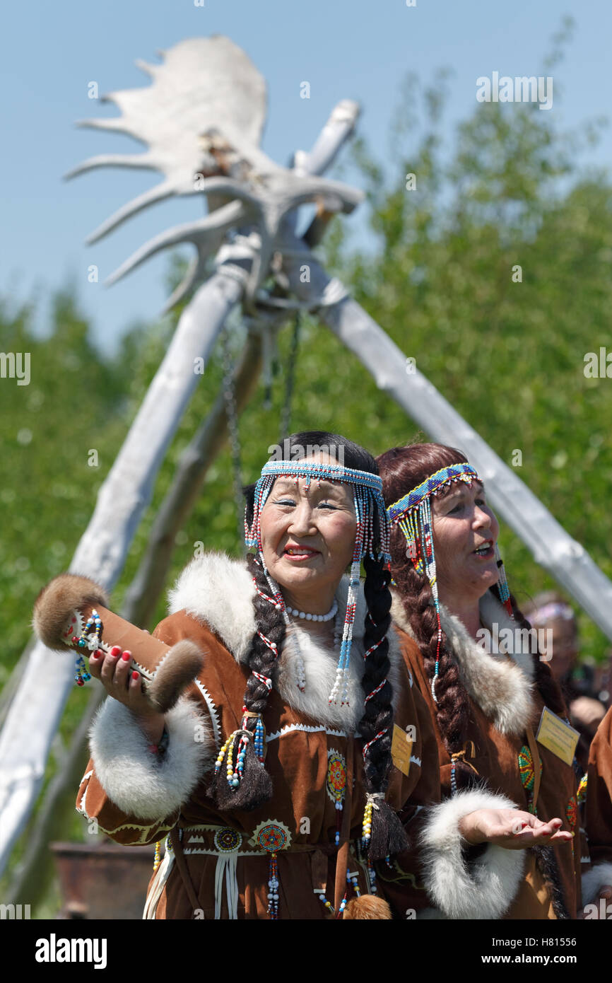 Woman in clothes aborigine of Kamchatka. Celebration of Day of the ...