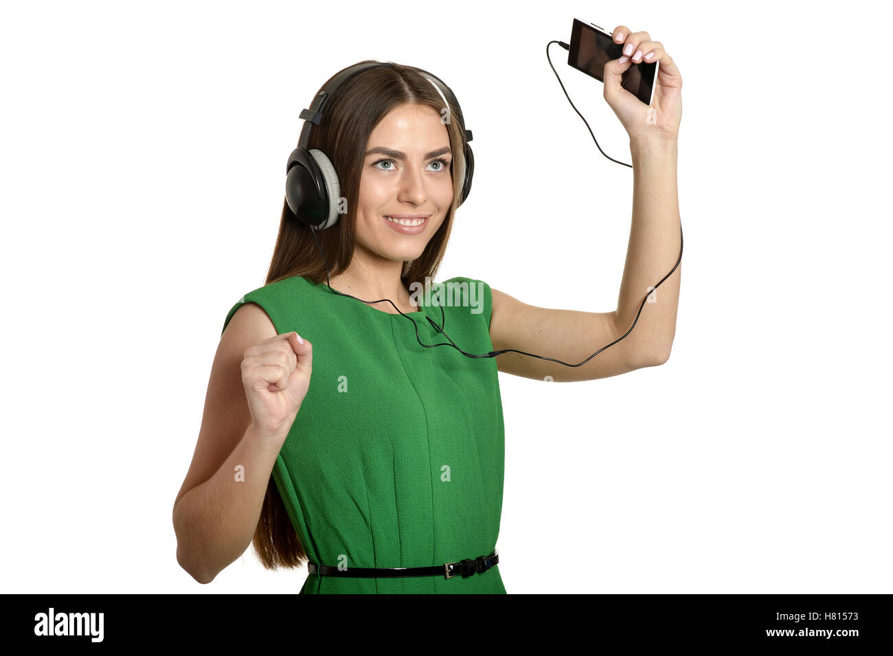 Happy beautiful girl using her mobile phone Stock Photo - Alamy