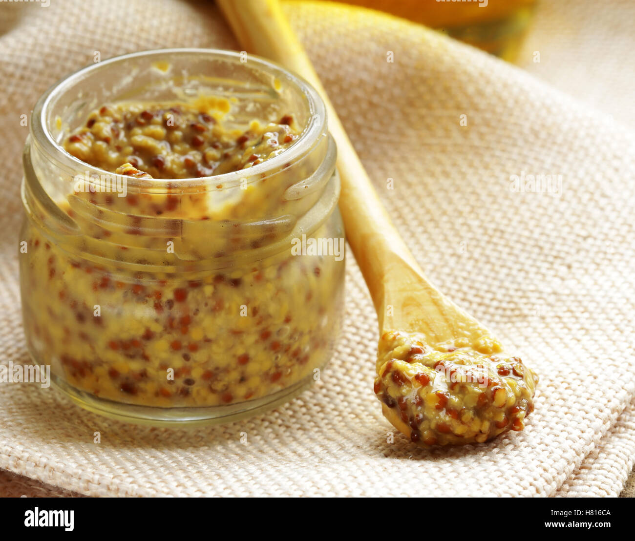 Traditional mustard sauce. Grain Dijon mustard Stock Photo - Alamy