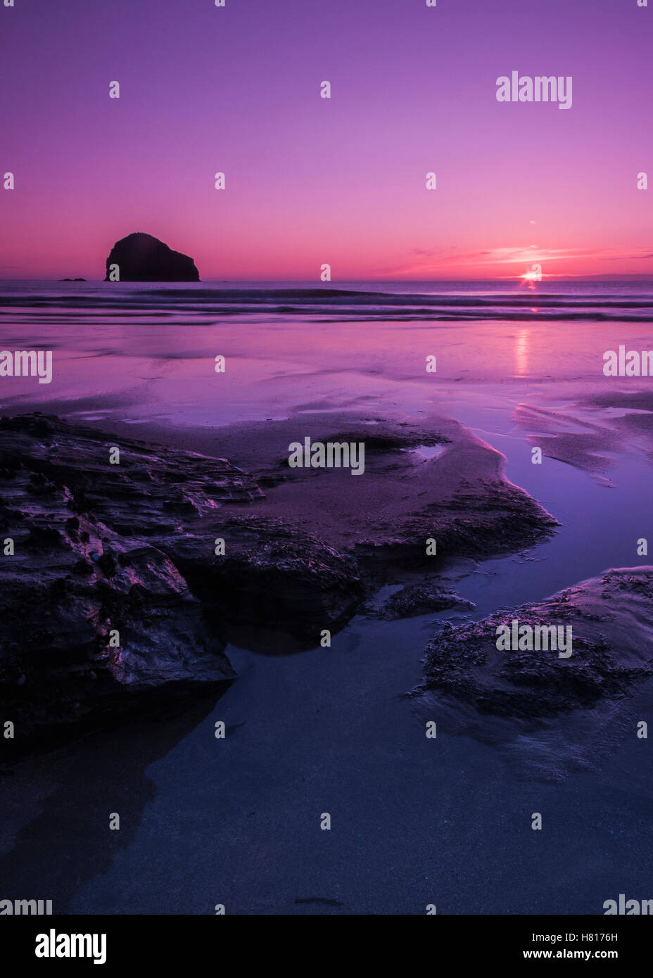 Sunset over rocky coastline hi-res stock photography and images - Alamy