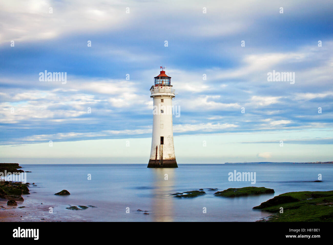 Perch Rock Lighthouse, New , on a still day with light cloud Stock ...