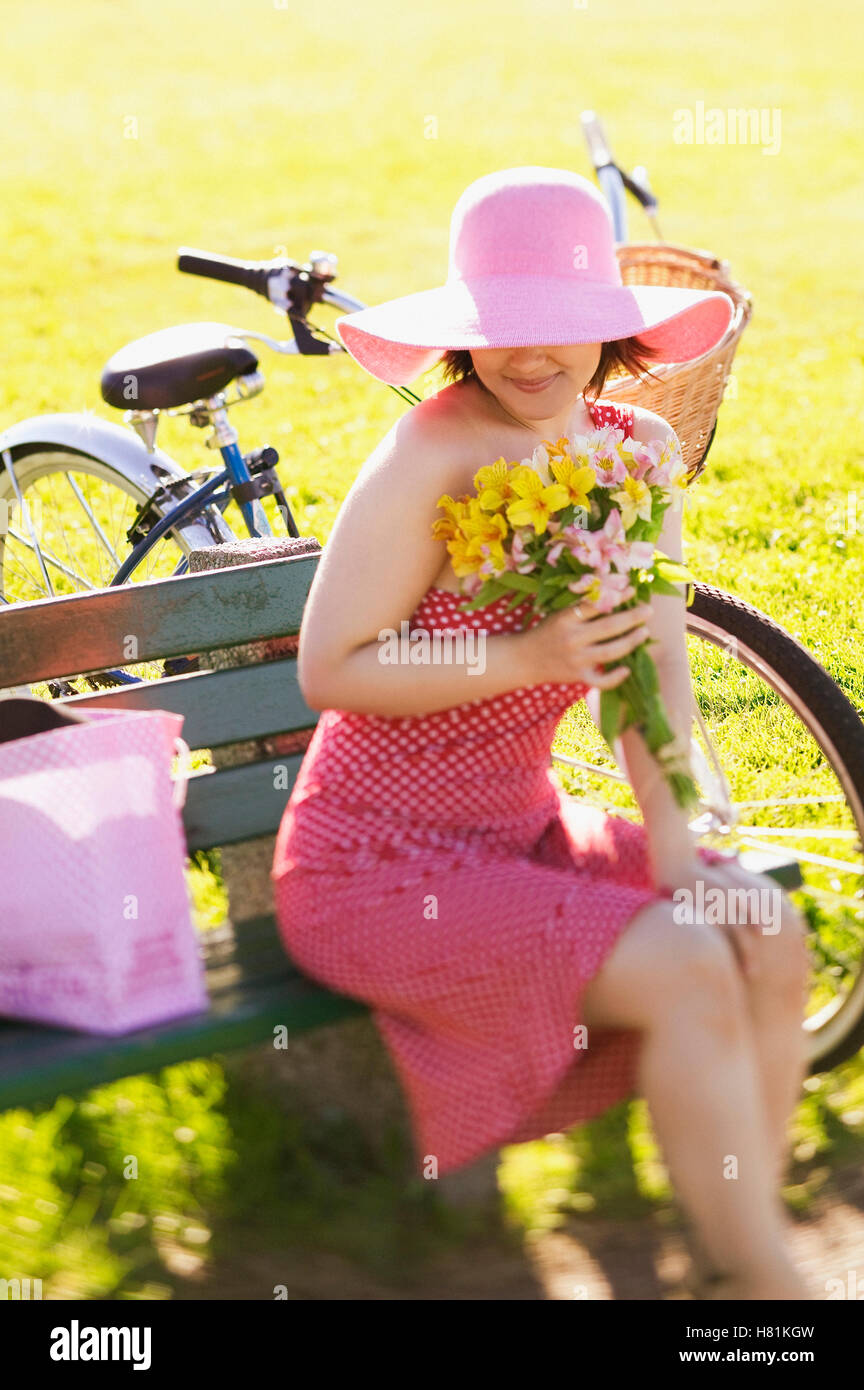 Beautiful woman relaxing park hi-res stock photography and images - Alamy