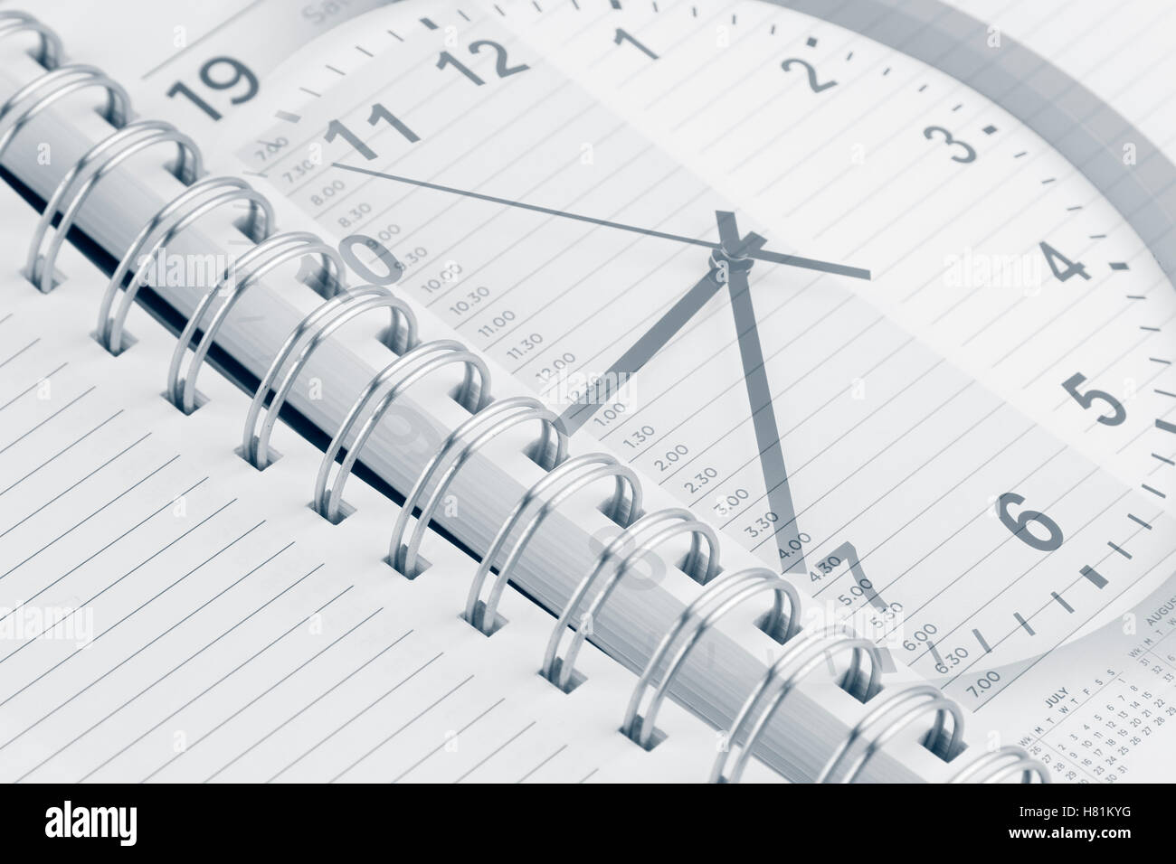Clock face and diary page Stock Photo - Alamy